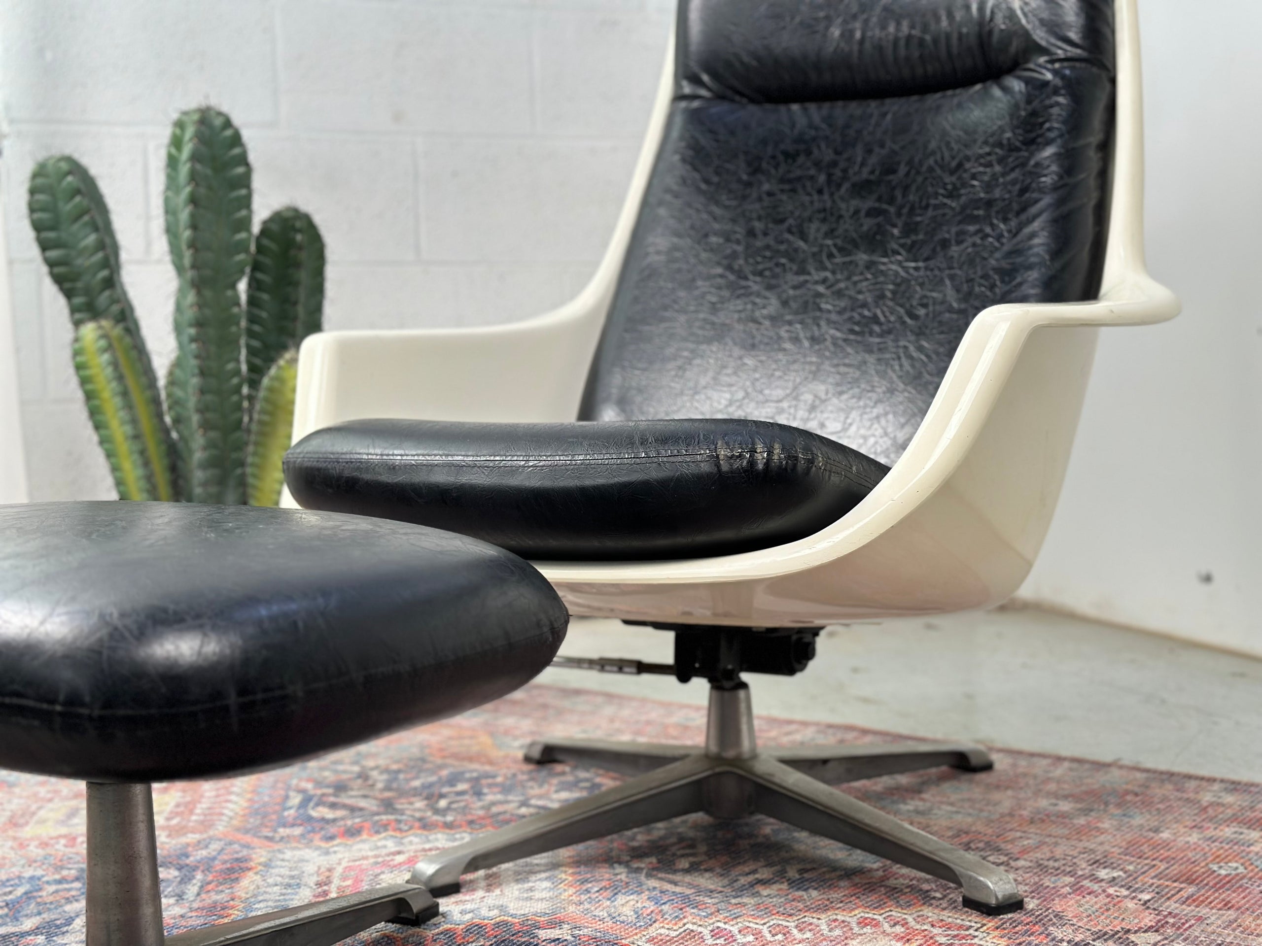 Sleek Mid-Century Modern Swivel Shell Lounge Chair & Ottoman | SimplyMidKC